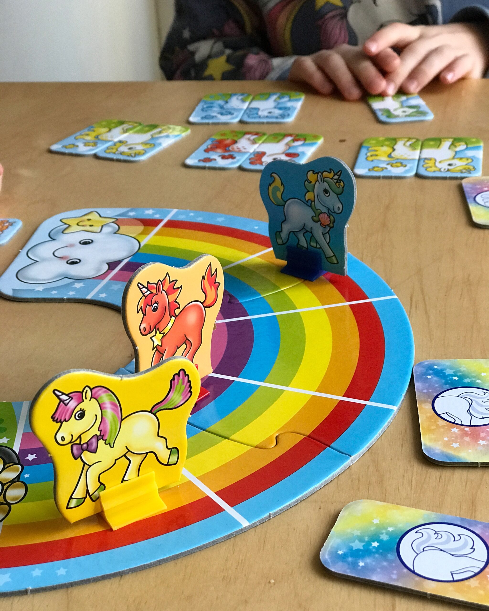 Orchard Toys Rainbow Unicorns playing board – The Bear & The Fox